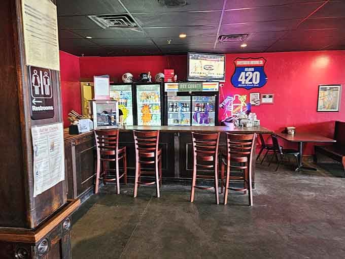 Bar seating with a view of the action, because watching other people's giant slices arrive builds character and anticipation.