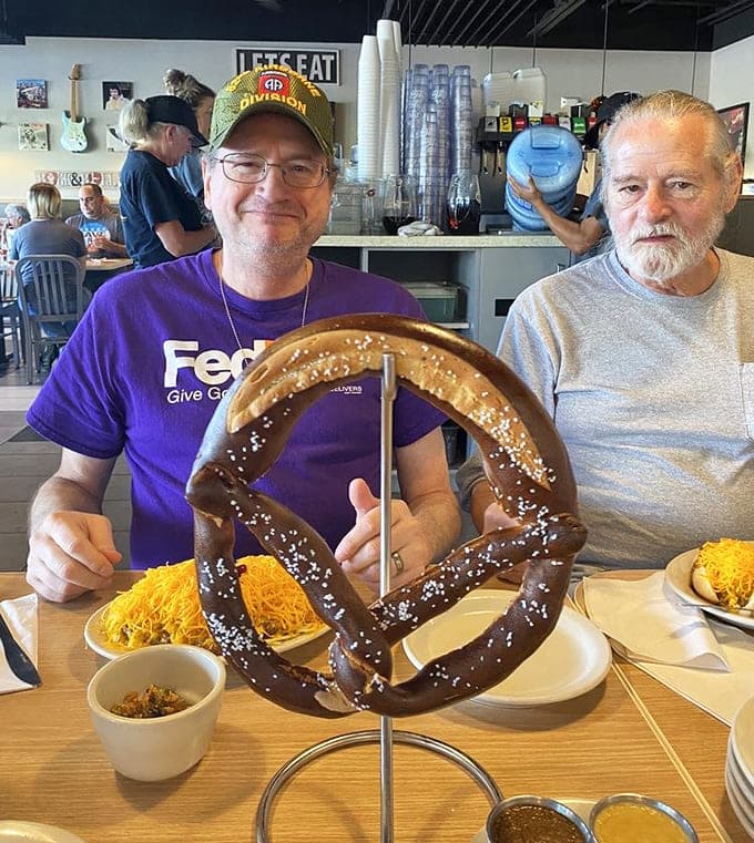 Happy diners enjoying massive meals in a space that feels like your favorite neighborhood hangout spot.