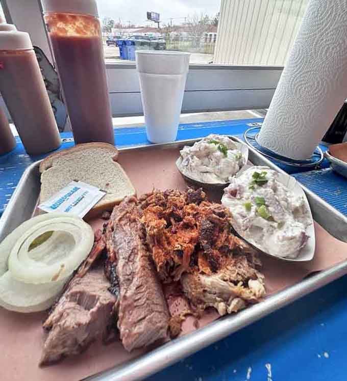 A brisket plate with all the fixings, proving that good things come on metal trays with paper.