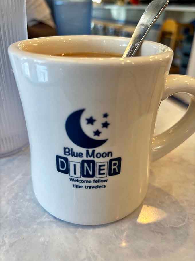 Coffee served in mugs that welcome "fellow time travelers" because this place knows exactly what it is.