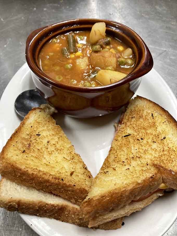 Hearty vegetable beef soup paired with grilled cheese is comfort food that hugs you from the inside out.