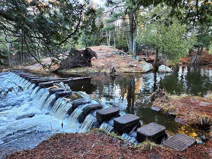 Stepping stones cross the calm pool above the falls, where adventurous souls can get even closer to nature.