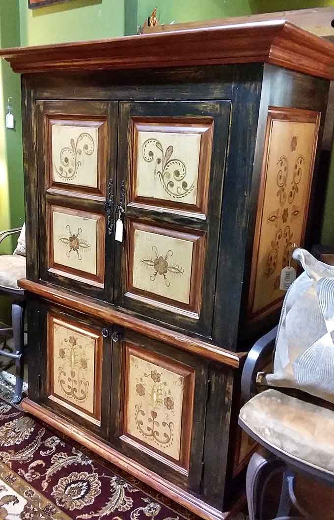 This hand-painted cabinet whispers tales of Mediterranean villas and Tuscan sunsets. Your cereal boxes have never had such elegant housing.