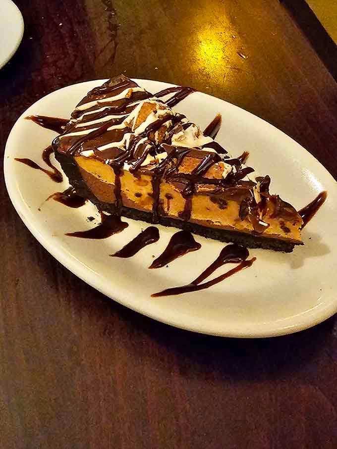 Dessert drizzled with chocolate in a pattern so artistic, you'll almost feel guilty eating it. Almost, but not quite.