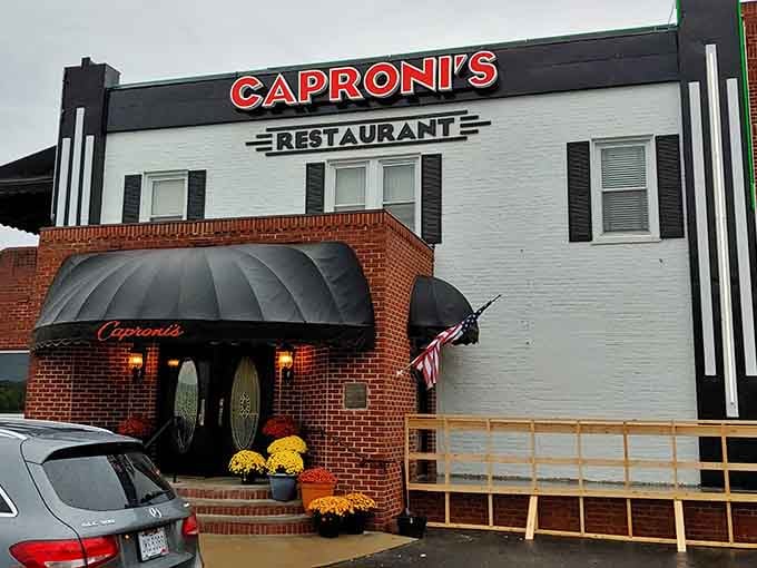 Caproni's Restaurant stands proud, looking exactly like the kind of place where pizza is taken seriously as both art and sustenance.