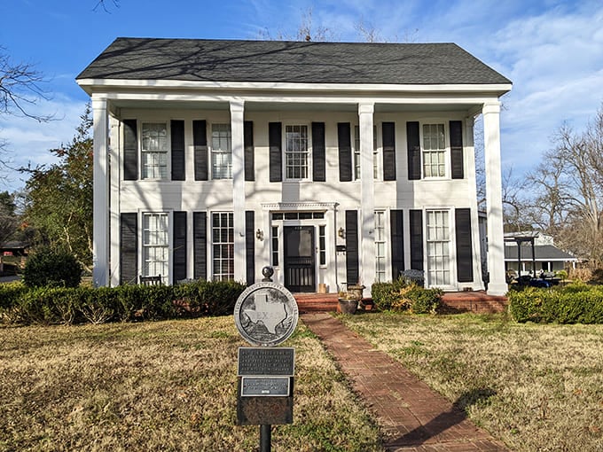Captain's Castle stands proudly in black and white elegance, its columns and shutters a perfect example of Southern architectural formality without the stuffiness.