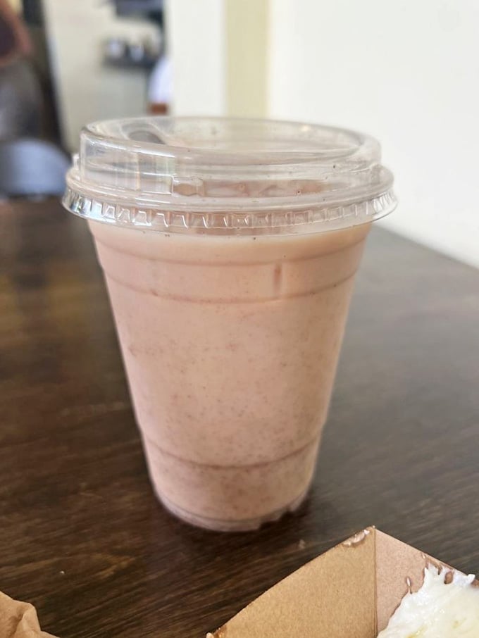 Their chai latte—where spice meets comfort in a cup that makes Minnesota winters almost bearable. Almost.