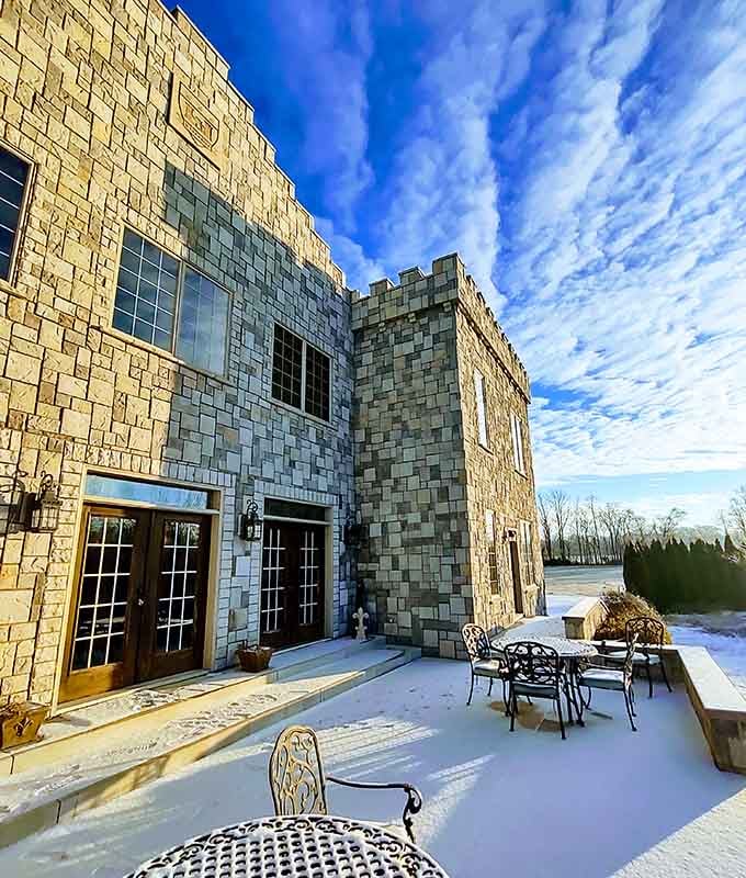 Even winter can't diminish the castle's majesty when snow blankets the battlements and outdoor entertaining spaces.
