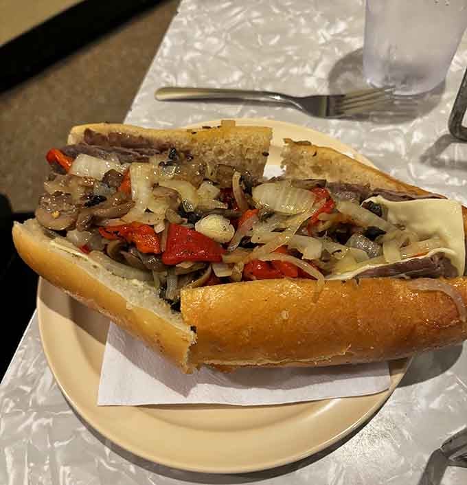 That cheesesteak loaded with peppers and onions shows Conte's doesn't just do pizza, they do comfort food right.