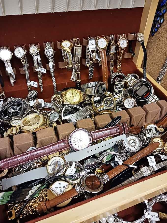 A drawer full of timepieces proves that people once wore watches that required winding, not charging overnight.