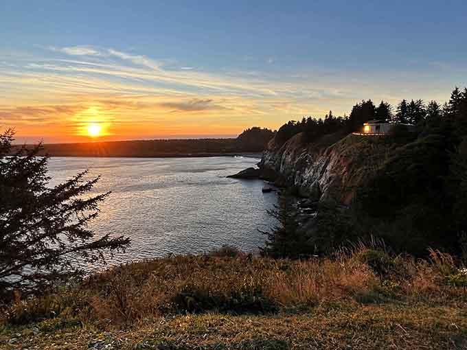 Sunset over Cape Disappointment proves the name is wildly inaccurate, painting the sky in colors that defy description.