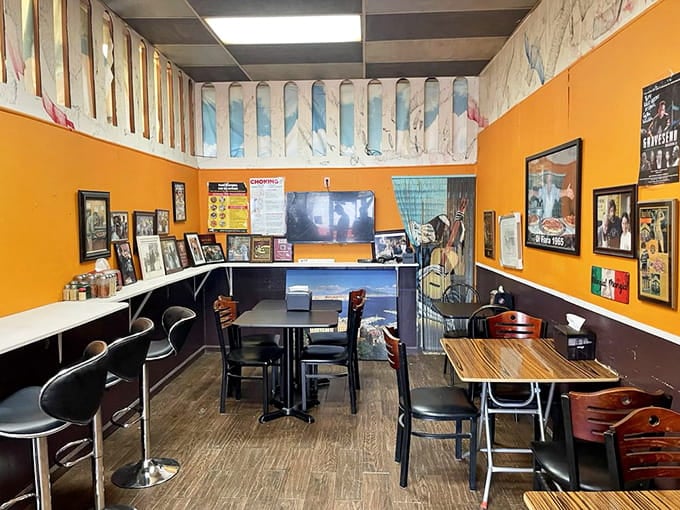 The dining area may be cozy, but those orange walls radiate warmth like a Brooklyn sunset made edible.