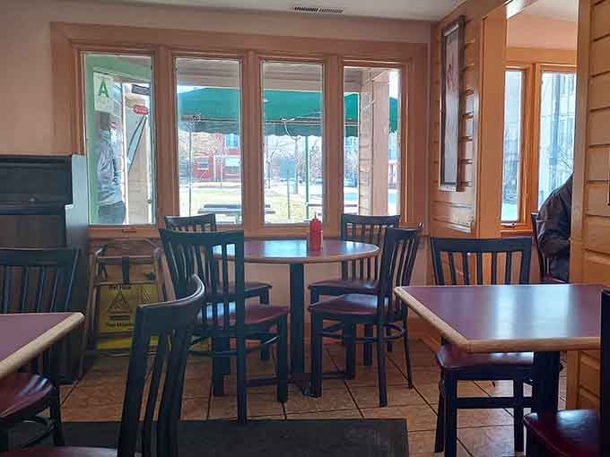 Wood-trimmed windows and simple seating that prioritize comfort over Instagram-worthy design trends and hashtags.