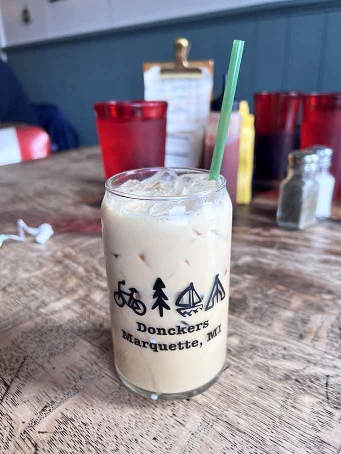 A Caramel Sea Salt Latte in a glass that screams "Marquette" louder than any postcard ever could.