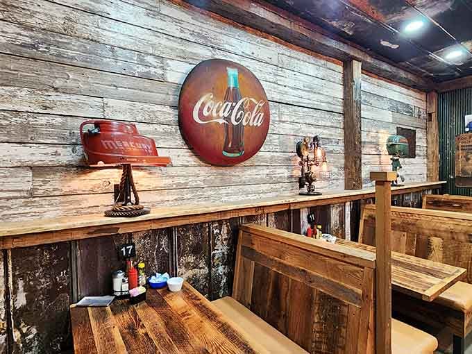 Vintage Coca-Cola signs and weathered wood create that authentic vibe you can't fake with a decorator's catalog.