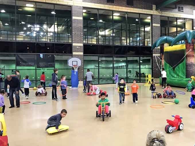Ride-on toys and scooters transform the open floor into a miniature highway system with surprisingly few traffic violations.