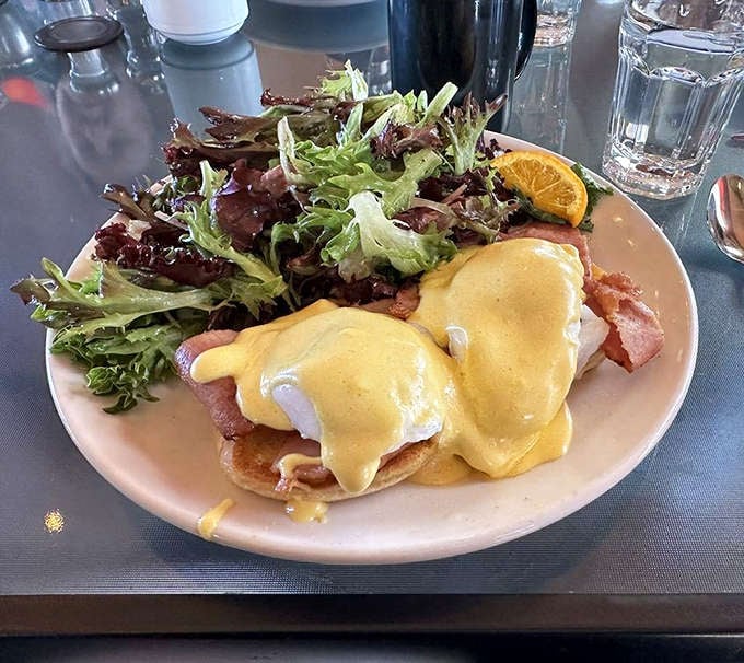 Eggs Benedict: the breakfast equivalent of wearing a tuxedo. That hollandaise sauce drapes over everything like liquid sunshine.