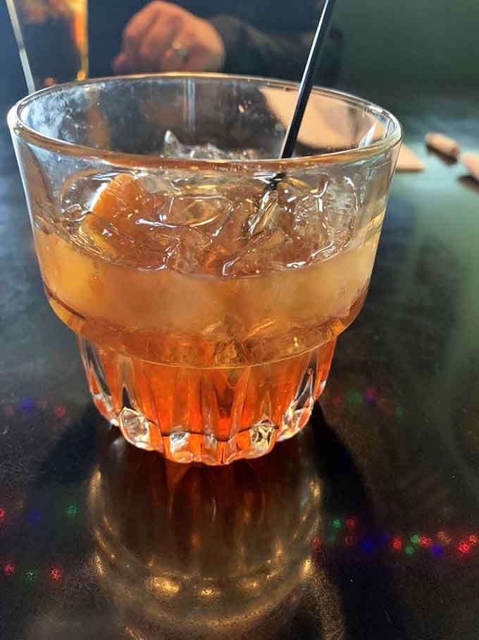 This isn't just a cocktail; it's liquid amber sunshine in a cut-crystal glass. The perfect companion while watching Anchorage life unfold around you.