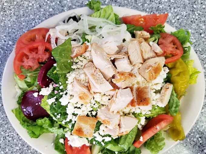 Fresh greens, grilled chicken, and feta cheese—proof that even classic diners have evolved with the times.