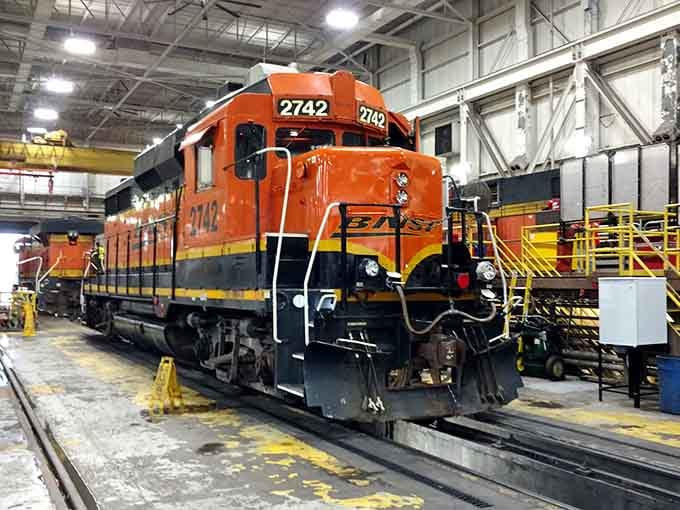 Railroad history comes alive in vibrant orange and black. This locomotive represents Galesburg's beating heart&mdash;a town where train whistles provide the soundtrack.