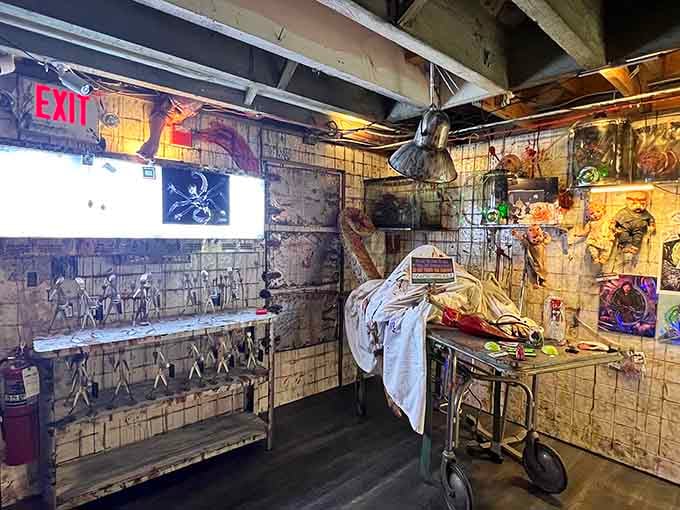 The hospital gurney setup is either deeply disturbing or brilliantly theatrical, depending on your perspective.