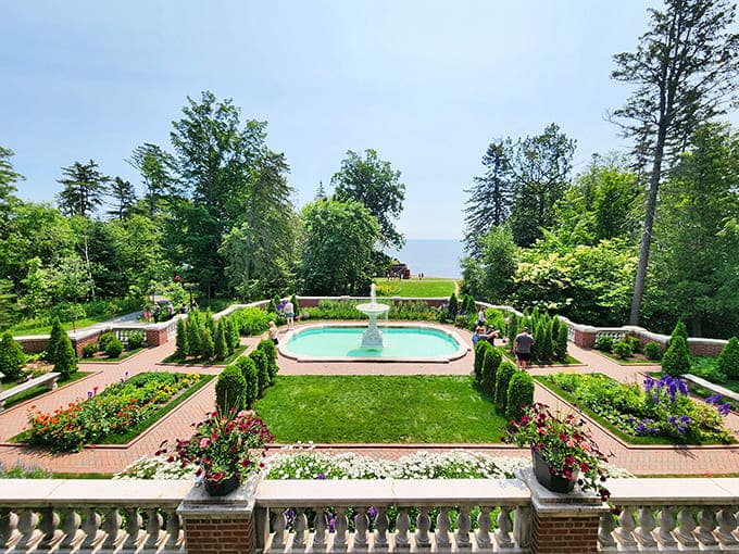 These formal gardens stretch toward Lake Superior, offering views that justify every penny spent on this estate.