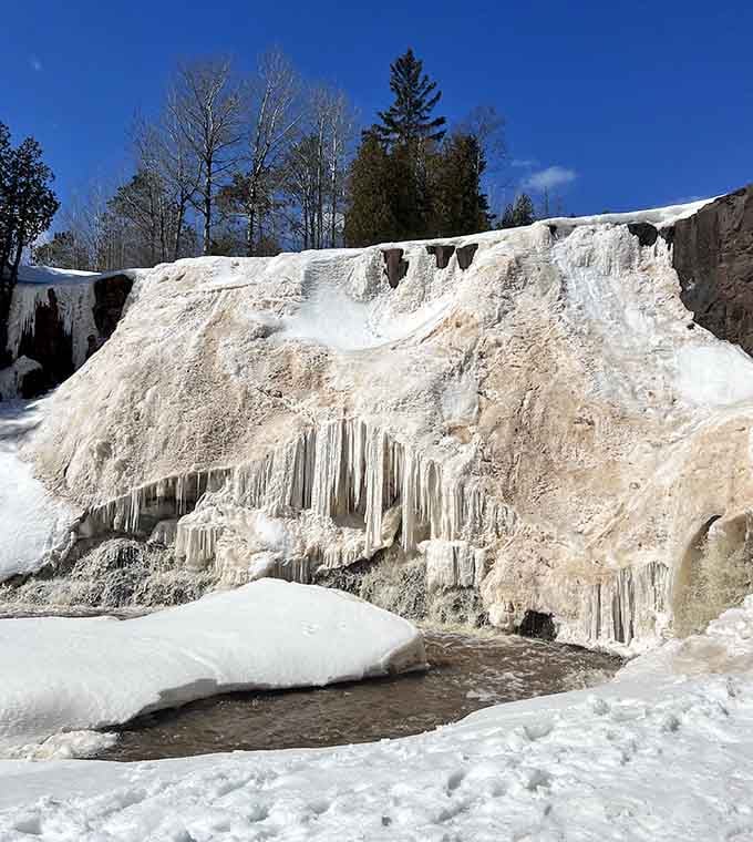 Winter transforms the falls into frozen sculptures that would make any ice artist weep with professional jealousy.
