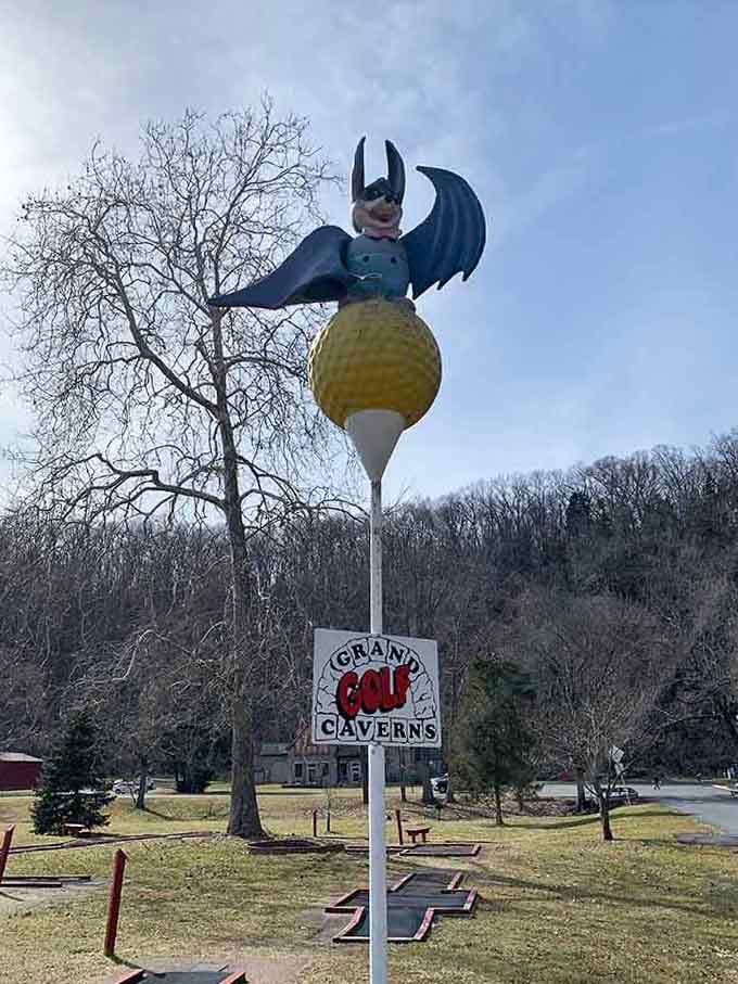 Even the miniature golf bat gets into the cave spirit, perched above a sign that promises family fun above ground too.