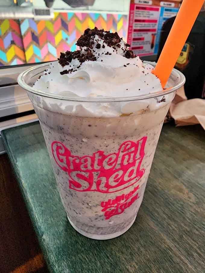 An Oreo shake topped with whipped cream and cookie crumbles, because subtlety has left the building entirely.