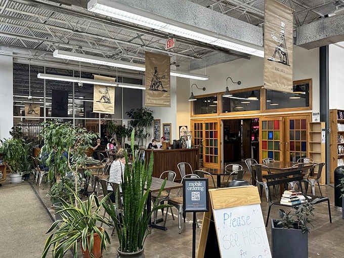 Cozy reading nooks with plants and seating invite you to sample your finds before committing to purchase.