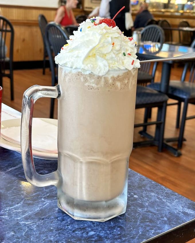 That milkshake mountain topped with whipped cream requires engineering skills to drink without incident.
