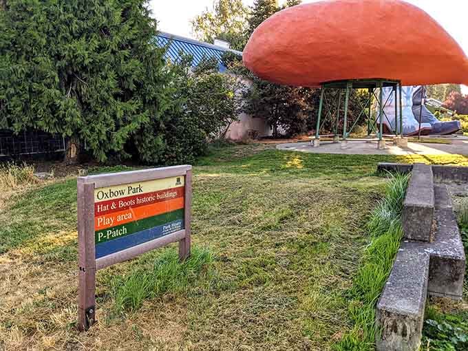 The park sign welcomes you to a place where historic buildings happen to be shaped like Western wear.