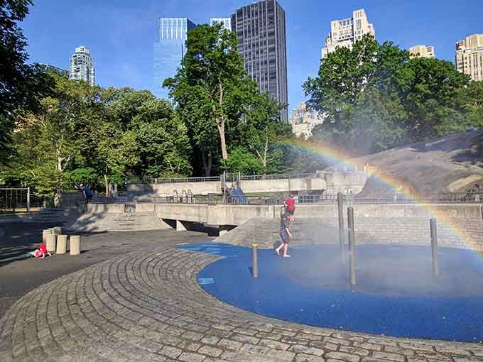 When water meets sunshine, you get rainbows and pure childhood magic happening right in the heart of the city.