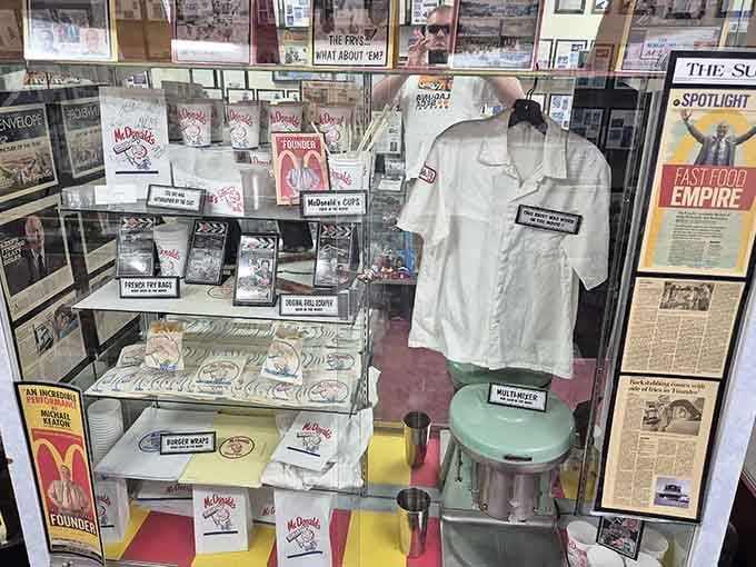 Vintage uniforms and paper goods remind us when fast food workers dressed sharper than most office employees today.