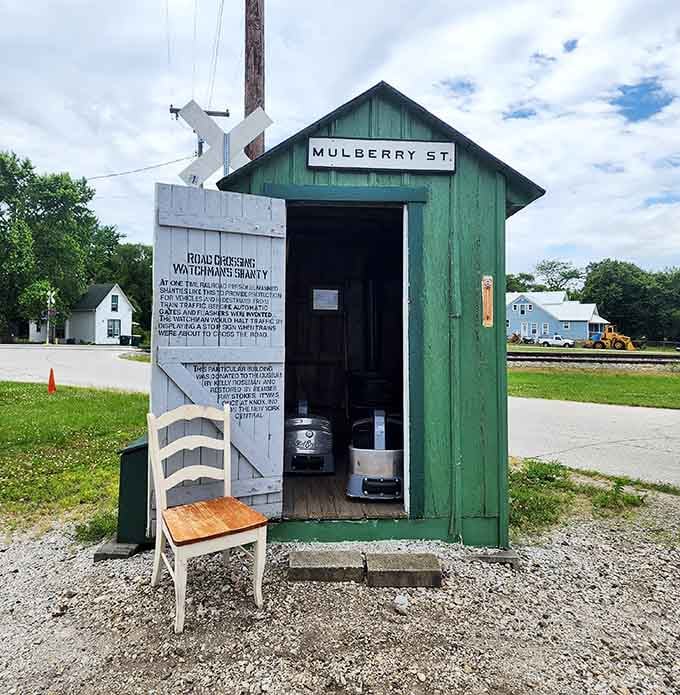 This humble watchman's shanty at Mulberry Street crossing once sheltered the guardians of safety where road met rail.