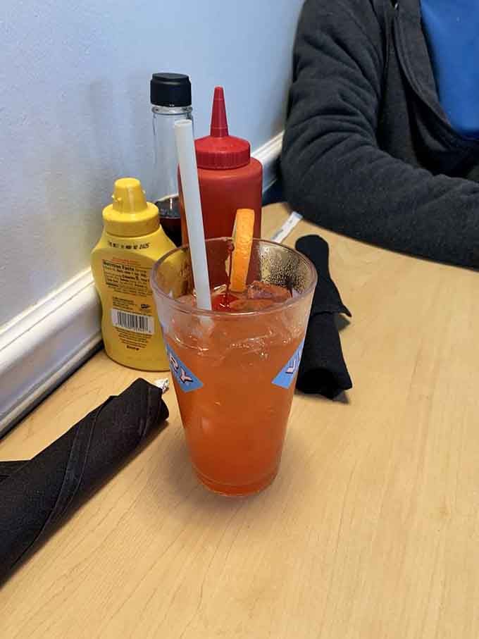 This isn't just a drink&mdash;it's a Delaware hurricane in a glass, complete with enough garnish to qualify as a small fruit salad.