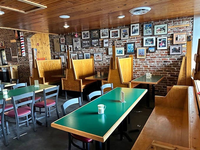 The wall of memories tells Shakespeare's story better than words&mdash;decades of community connection framed against that signature exposed brick.