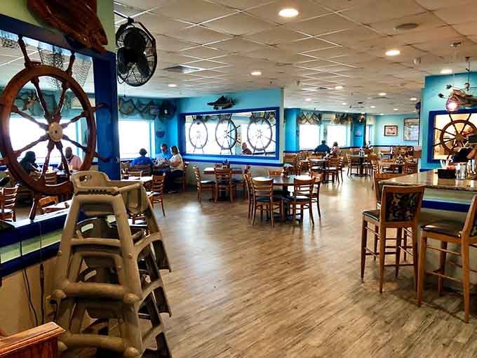 Nautical blues and warm woods create the feeling you've stepped aboard a well-loved vessel where the catch of the day is always happiness.