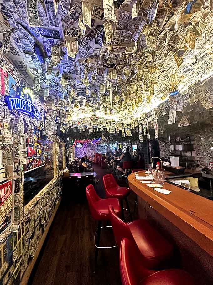 Money on the ceiling, memories on the walls. This cash-covered room feels like you've stumbled into a secret burger society's meeting place.