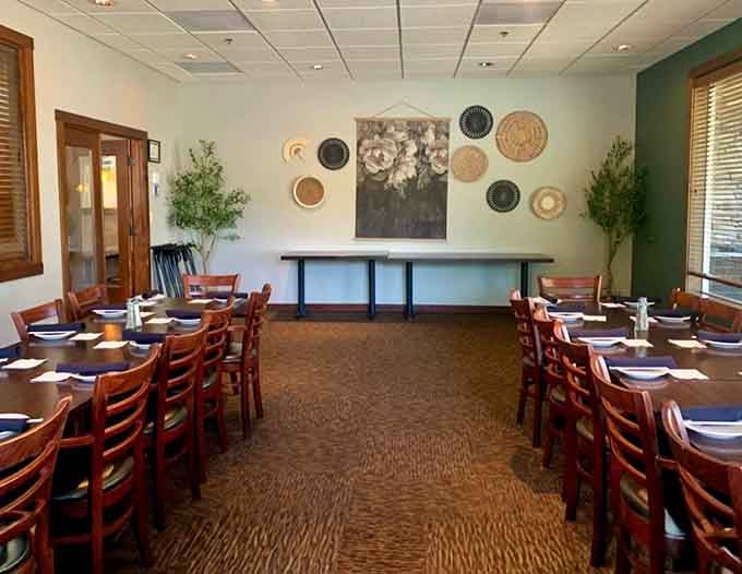 Private dining areas offer elegant simplicity with decorative touches that say "special occasion" without shouting it through a megaphone.