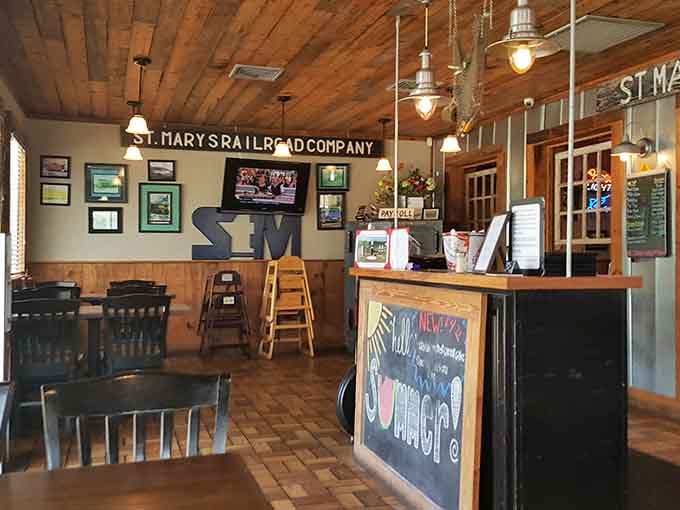 Wooden wainscoting and railroad memorabilia create that "been here forever" vibe. The kind of place where you instantly feel like a regular, even on your first visit.