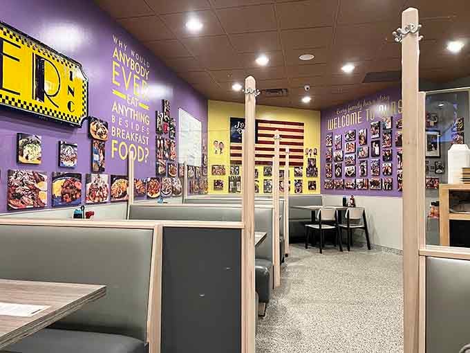 Purple walls covered in food photos and inspirational breakfast quotes create an atmosphere that's equal parts quirky and completely charming.