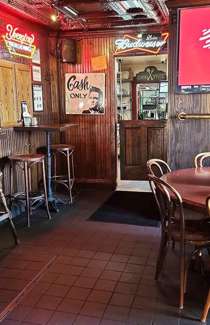 Vintage beer signs and cozy seating arrangements make this interior feel like your favorite uncle's perfectly appointed man cave.