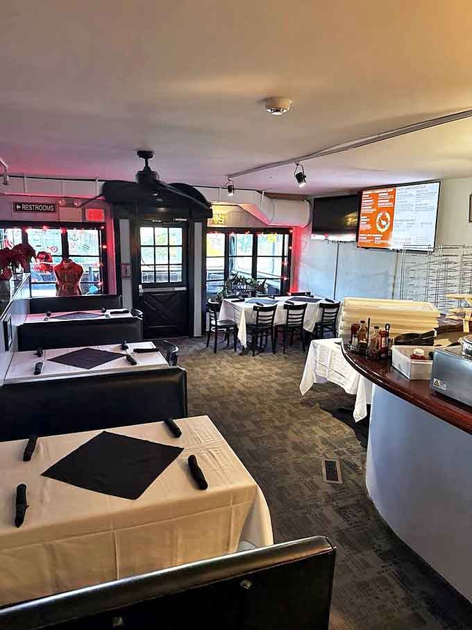 White tablecloths signal "we take food seriously" while the casual atmosphere whispers "but we don't take ourselves too seriously."