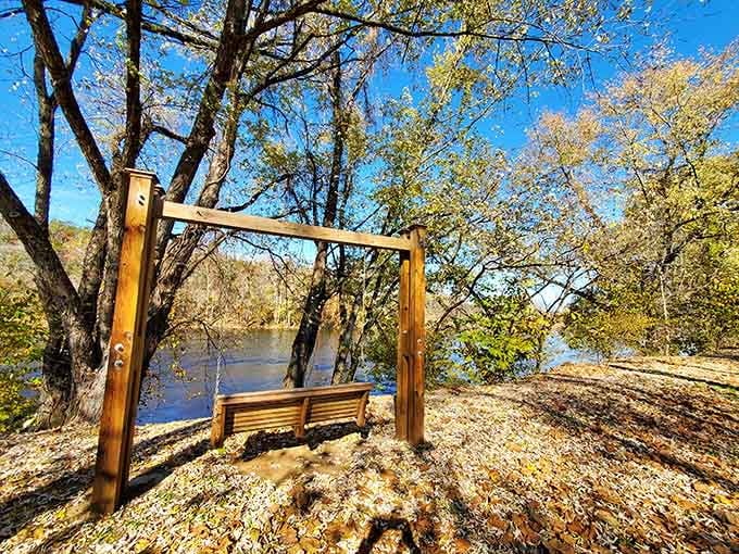 A riverside swing that's basically an invitation to sit and watch the world slow down properly.