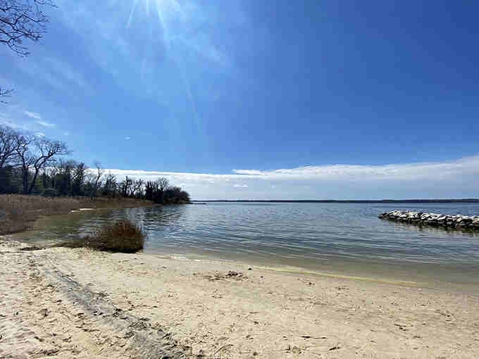 A peaceful beach where the Patuxent meets the shore, perfect for contemplating 9,000 years of human connection to water.
