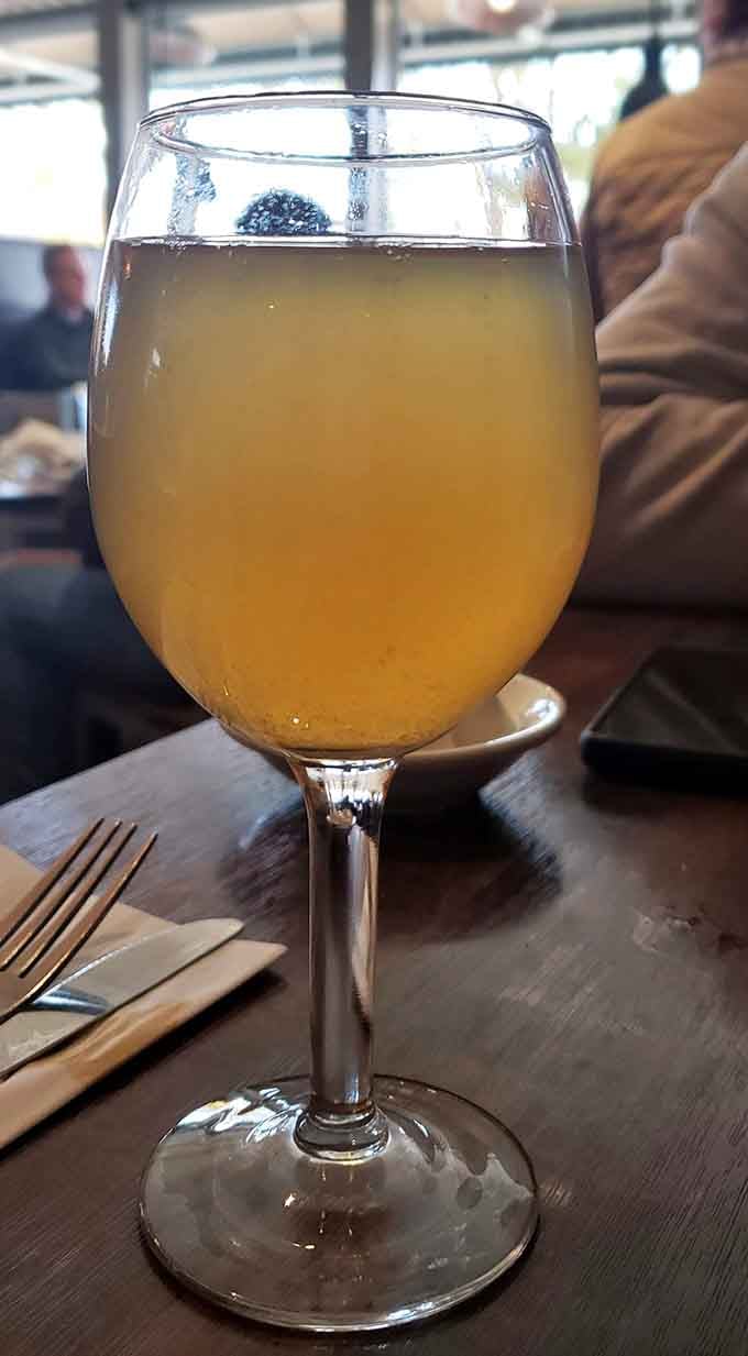 This mimosa looks like liquid sunshine decided to take a vacation in your glass this morning.