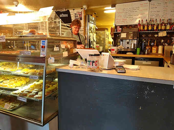 Behind every great donut is a friendly face ready to help you make the toughest decisions of your morning.