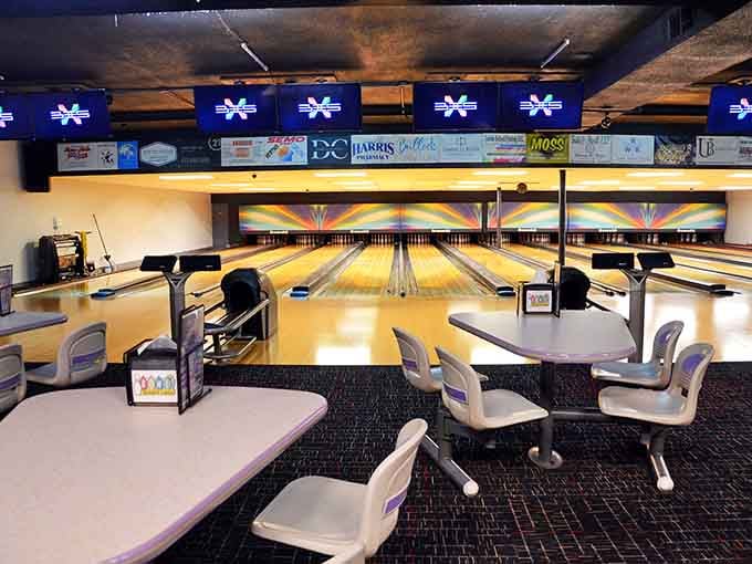 Vintage bowling lanes where strikes still earn genuine applause and everyone knows the house rules.