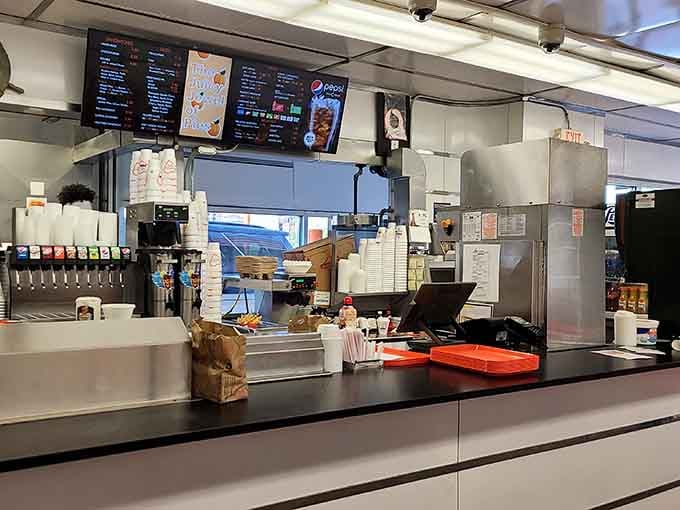 The order counter where decades of burger dreams have come true, one perfectly grilled patty at a time.